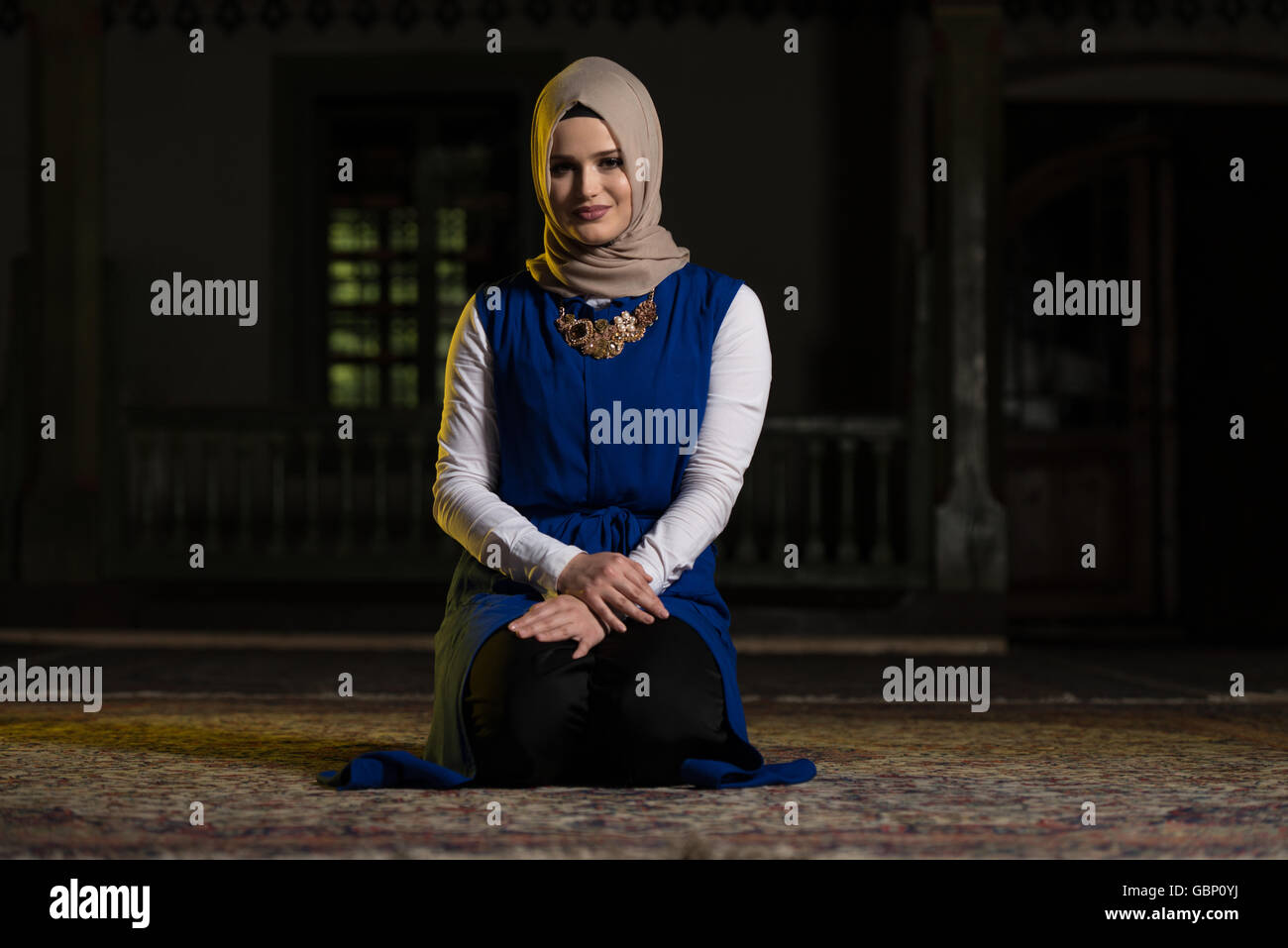 Humble Muslim Woman Is Praying In The Mosque Stock Photo - Alamy