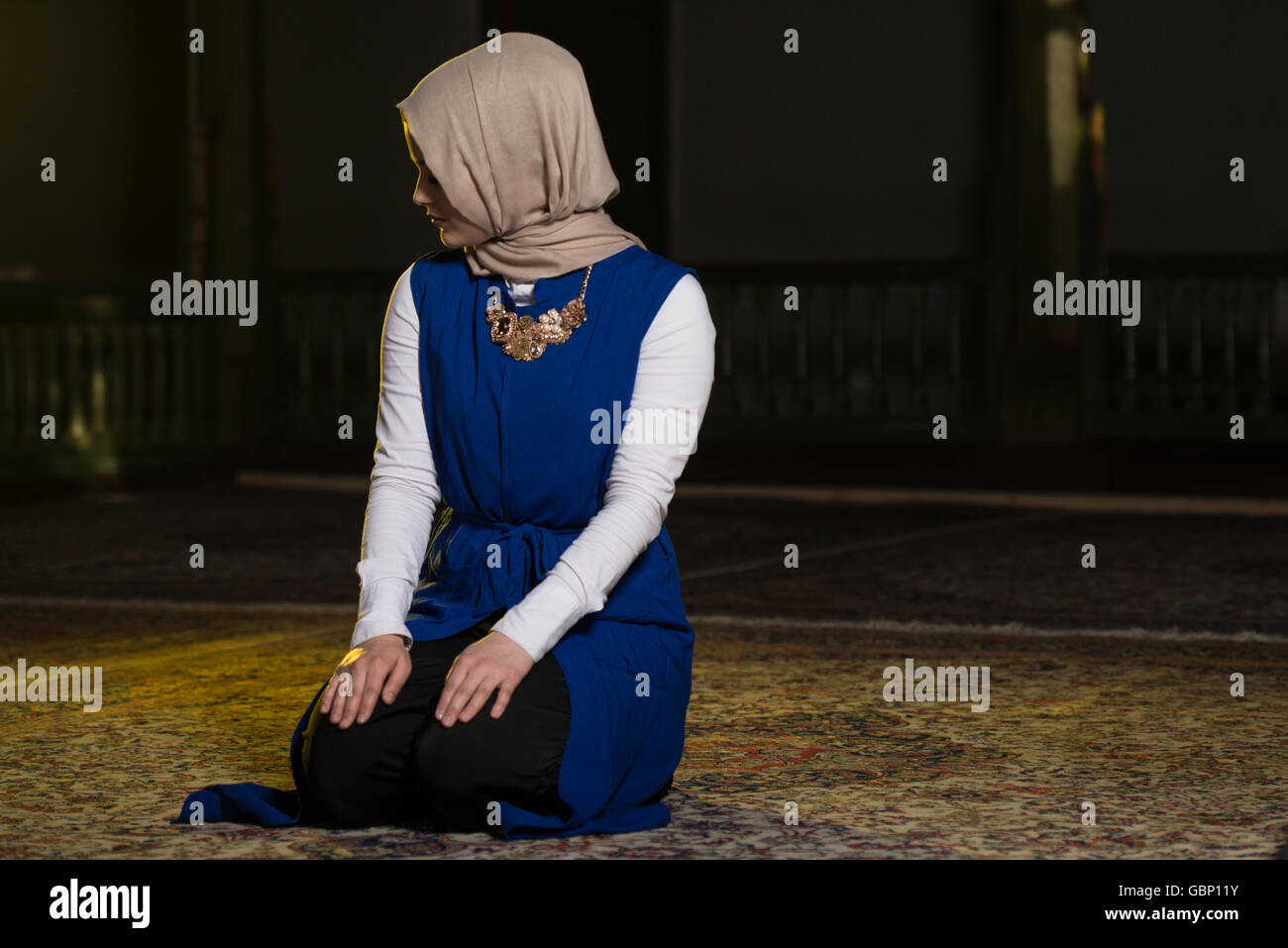 Humble Muslim Woman Is Praying In The Mosque Stock Photo - Alamy