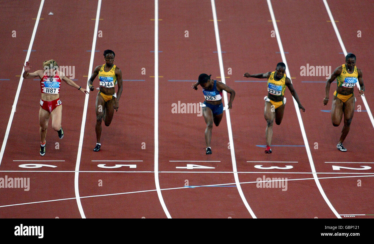 Yuliya Nesterenko from Belarus (lane 6) crosses the line first to win ...
