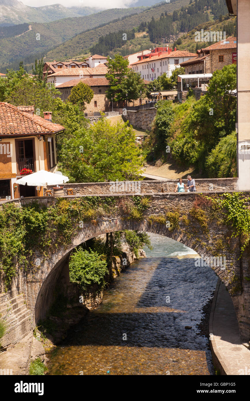 Bridge over the river Deva in the town of Potes in the Picos de Europa ...