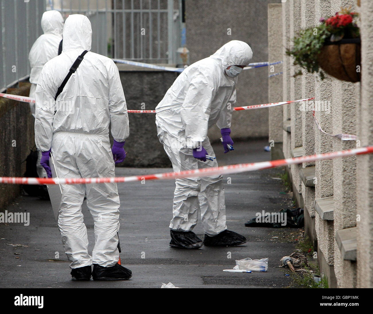 Kevin McDaid murder. Forensic police officers at the scene in Coleraine ...