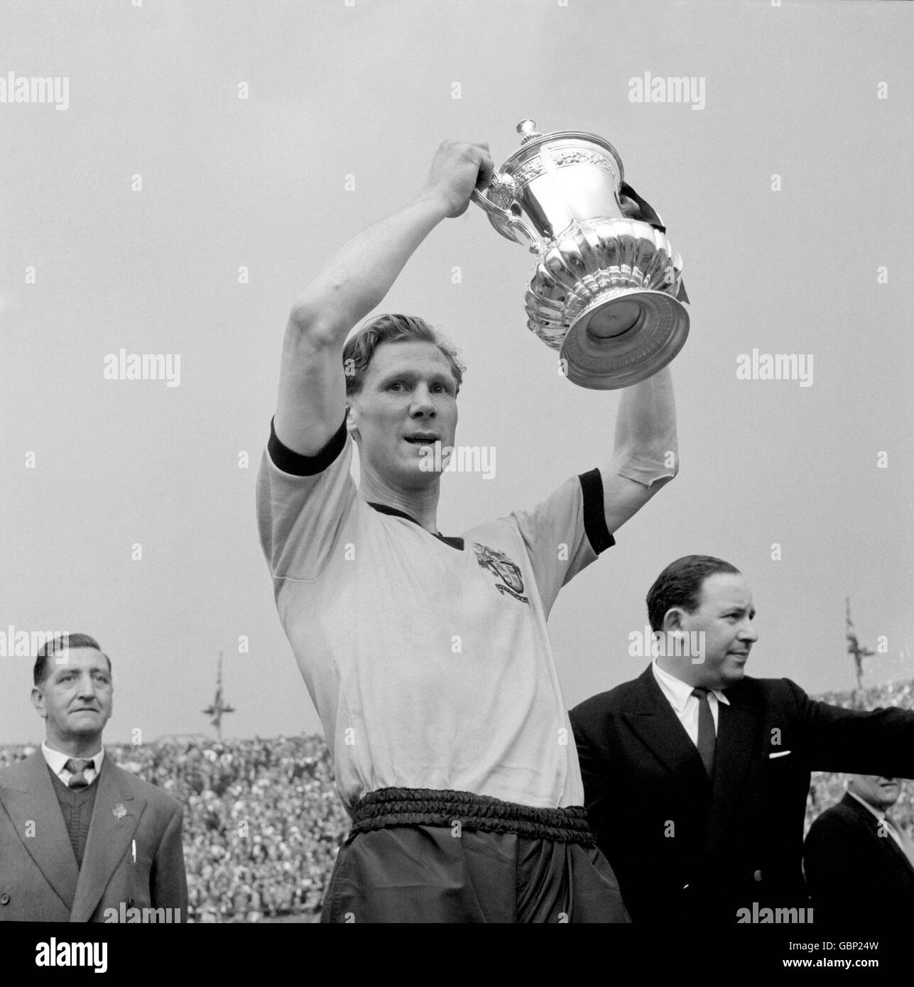 Wolverhampton Wanderers captain Bill Slater shows off the FA Cup after ...