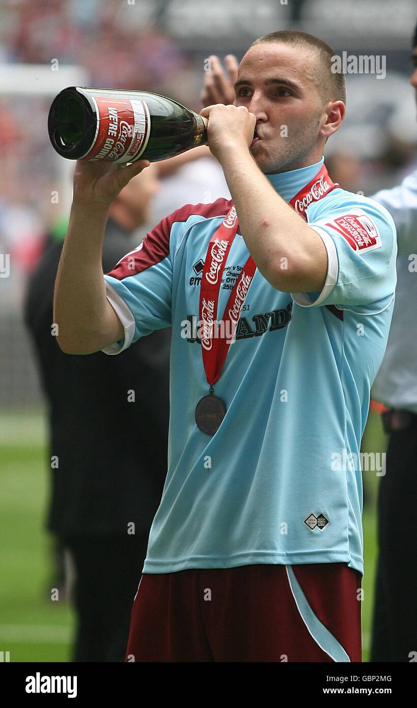 Burnley's Martin Paterson celebrates as their team gain promotion into ...