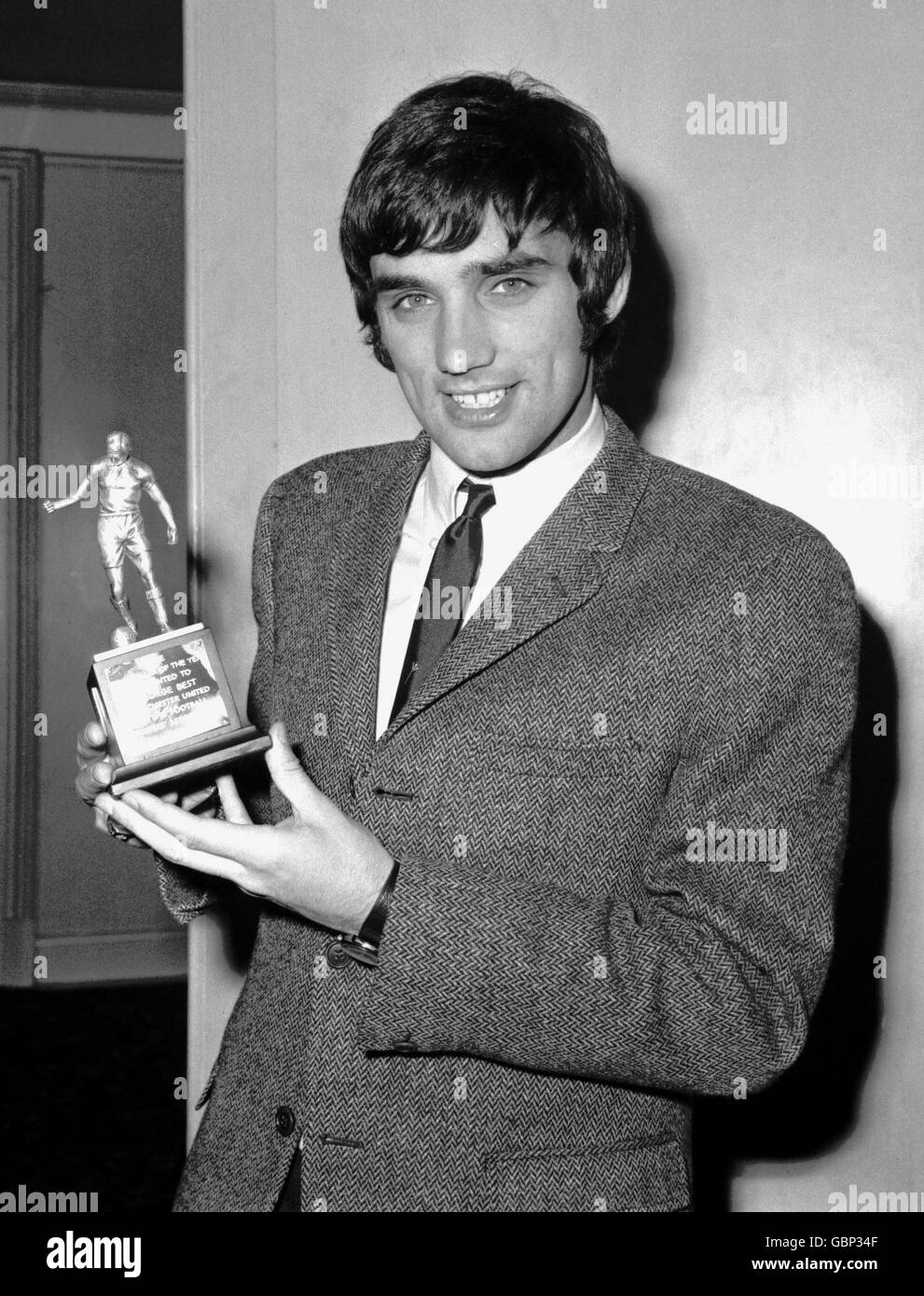 Manchester United's George Best shows off the Footballer of the Year ...