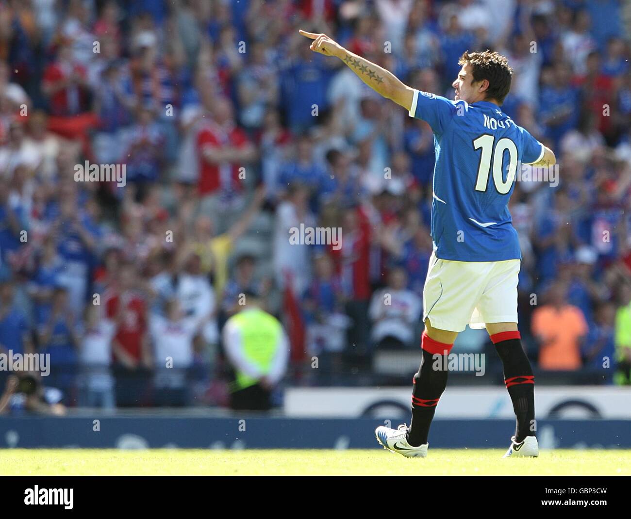 Rangers' Nacho Novo (centre) celebrates scoring the opening goal Stock ...