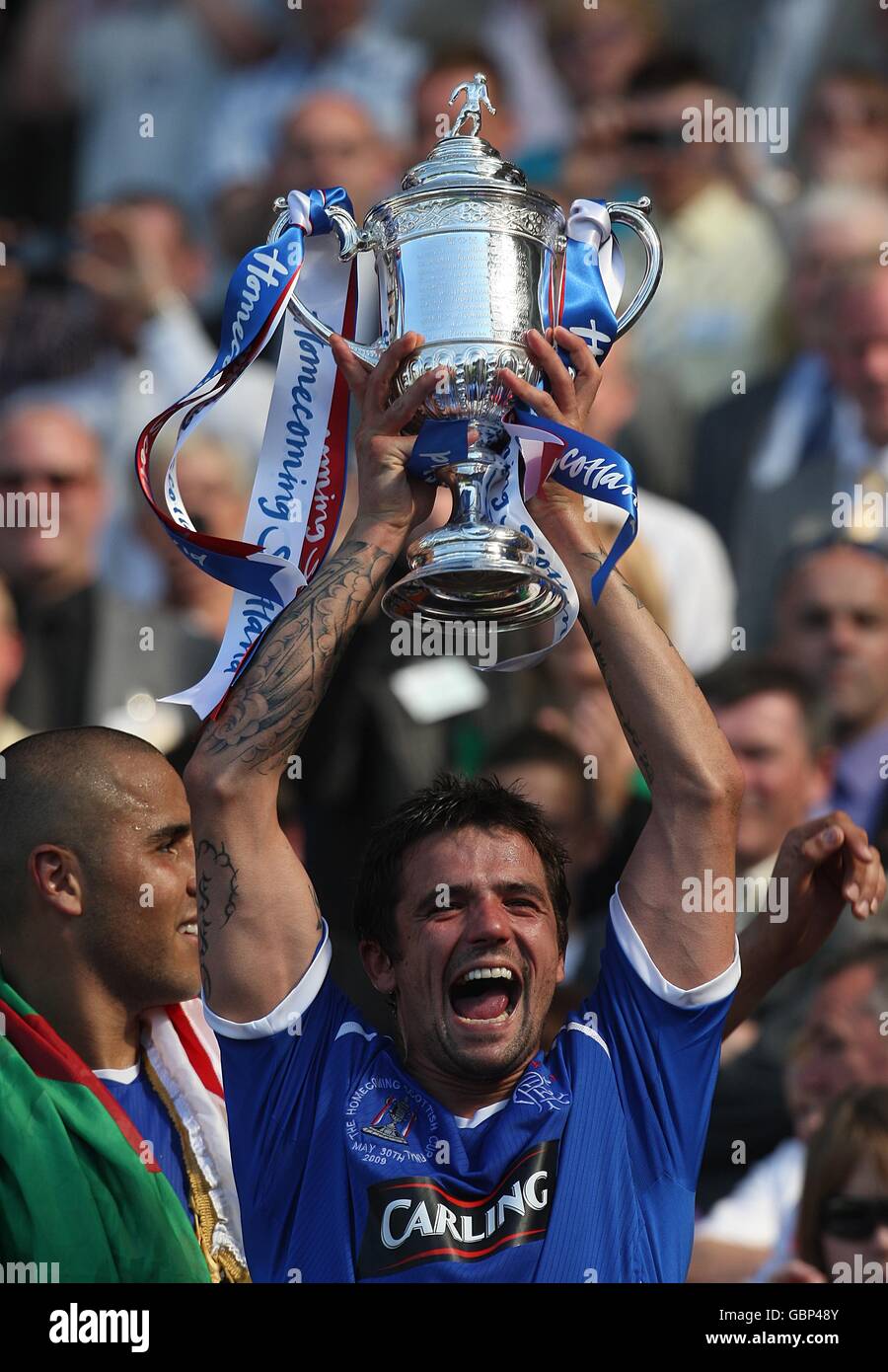 Rangers nacho novo celebrates with the homecoming scottish cup hi-res ...