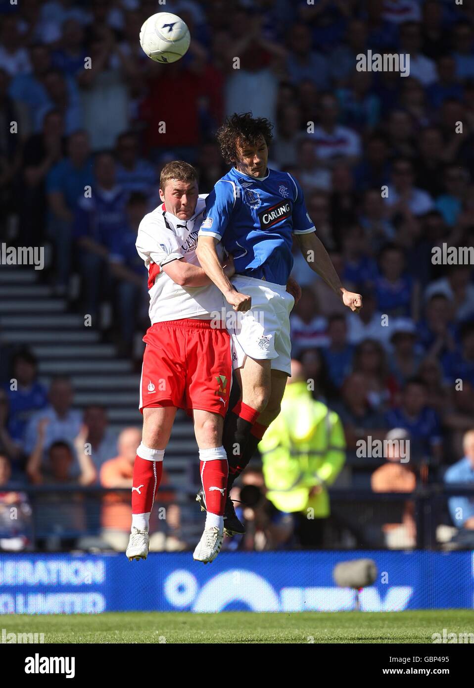 Falkirk's Thomas Scobbie (left) and Rangers' Christian Dailly (right ...