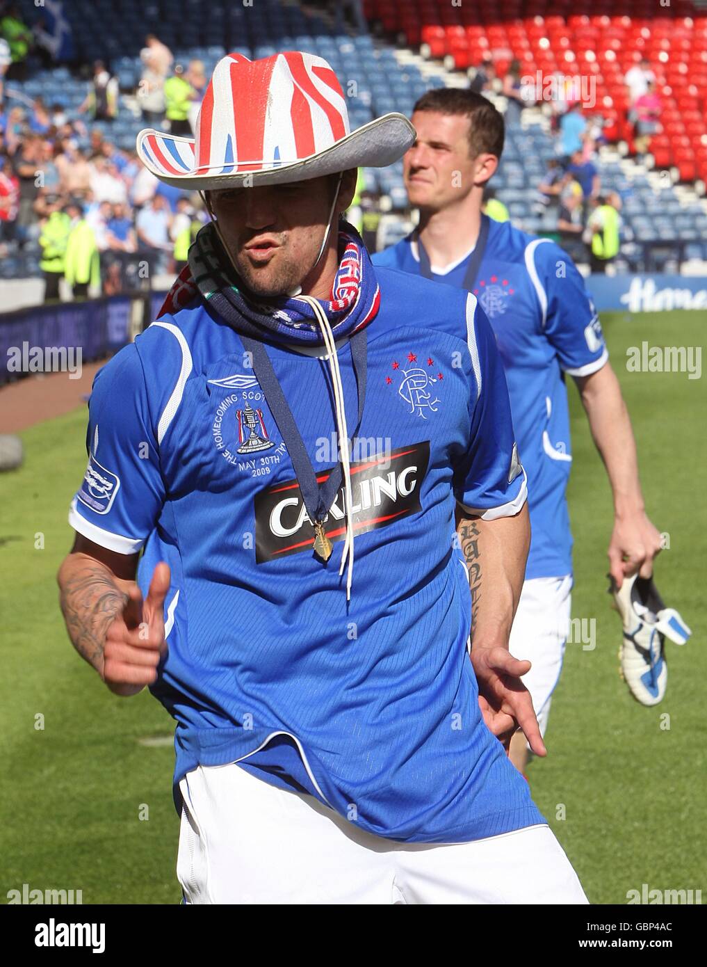 Rangers' Nacho Novo celebrates their win after the final whistle Stock ...