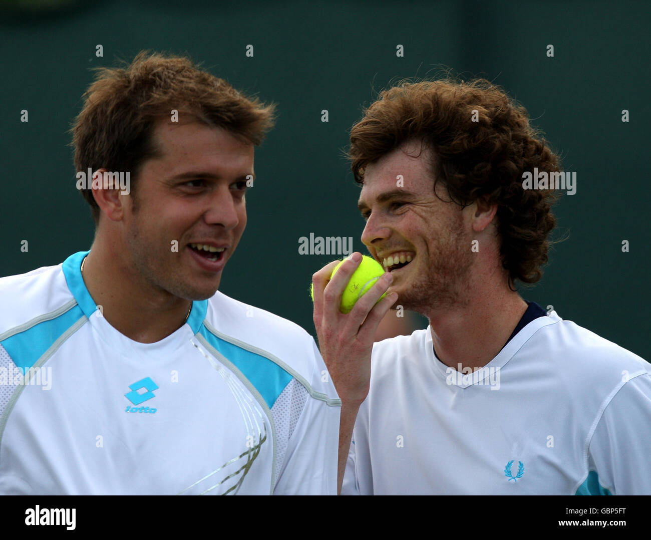 Shares laugh doubles partner luxemburgs gilles muller hi-res stock ...