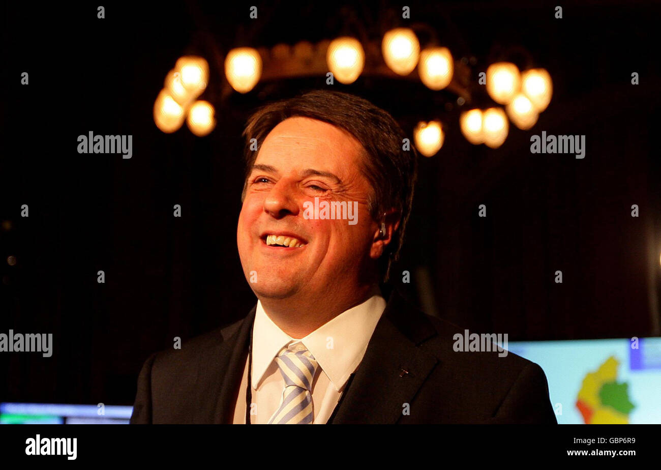 BNP leader Nick Griffin smiles as he gives a television interview ahead ...