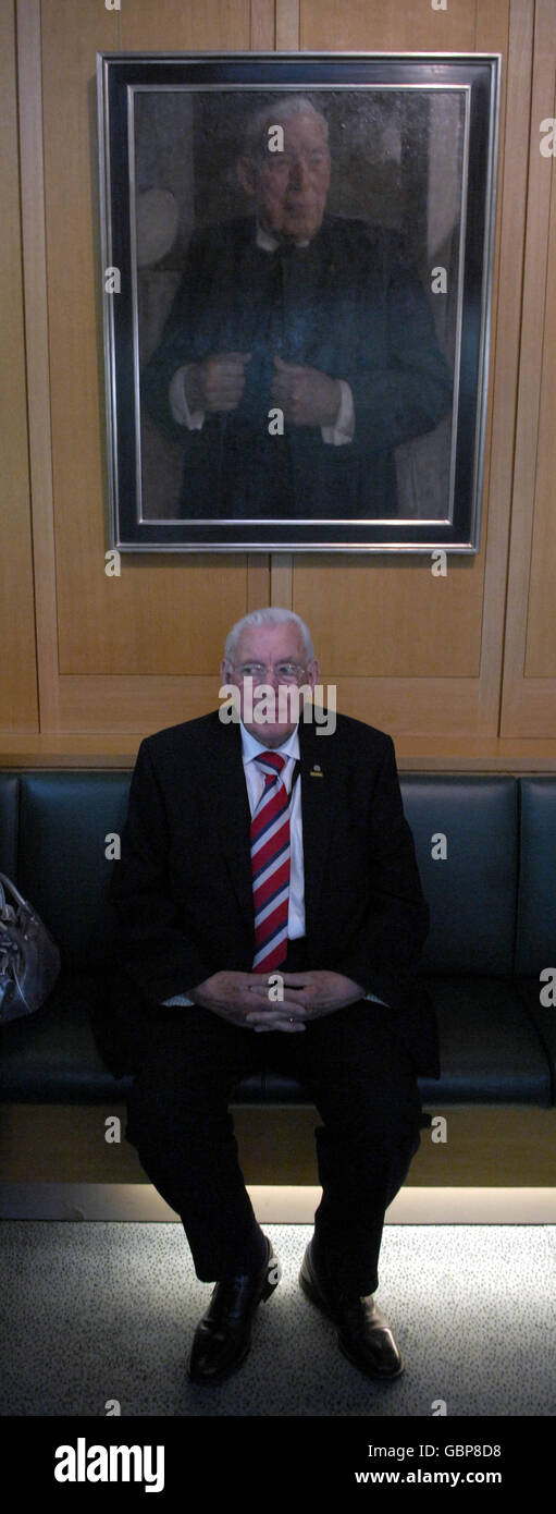 Dr. Ian Paisley MP speaks underneath a portrait of himself by artist ...