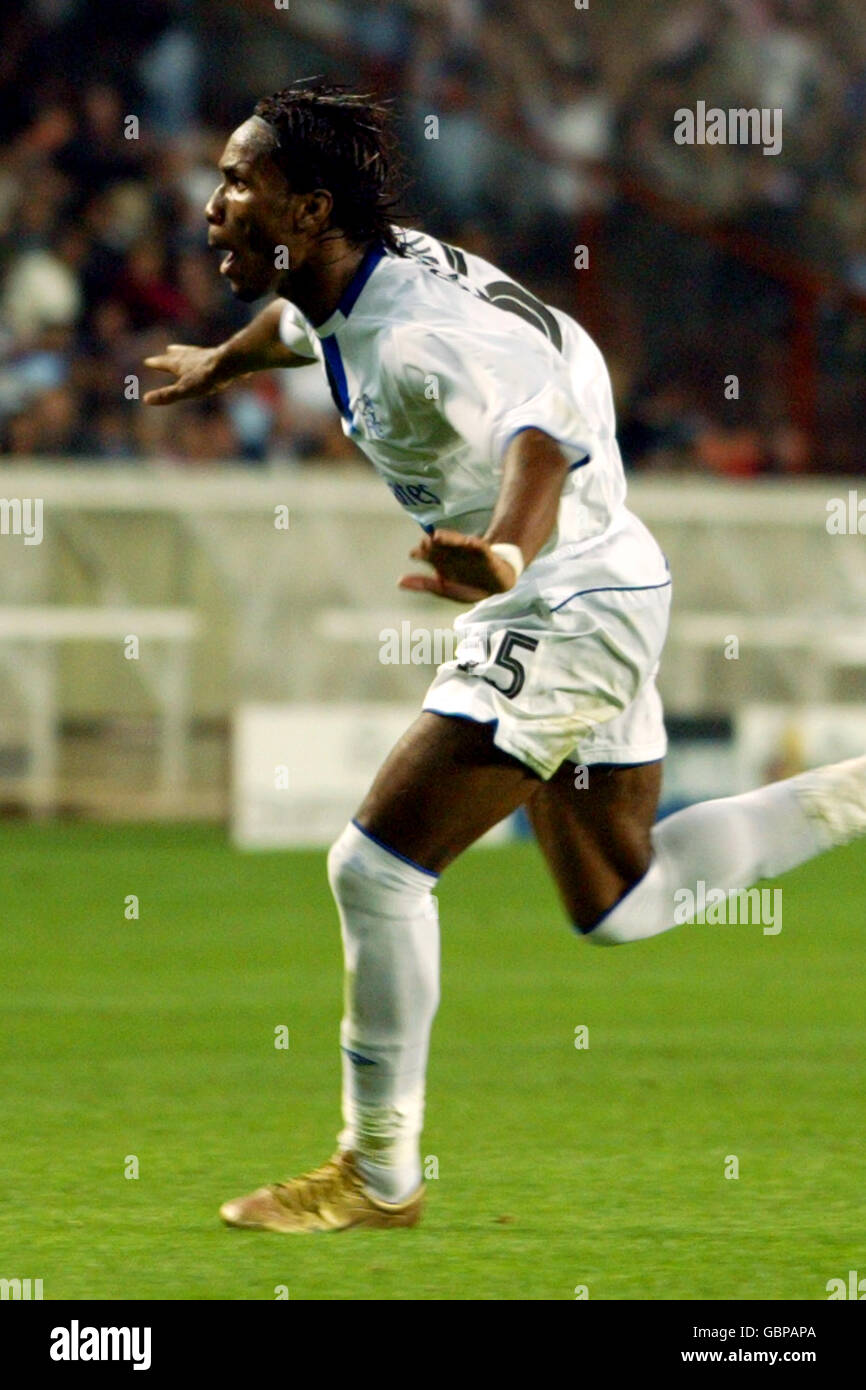 Chelsea's Didier Drogba celebrates scoring the third goal and his ...