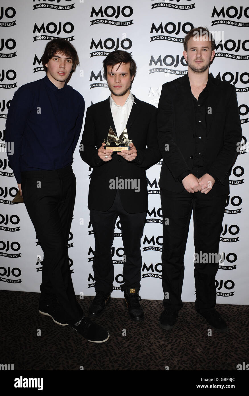 White Lies win the Breakthrough Act award at the Mojo Awards at The ...