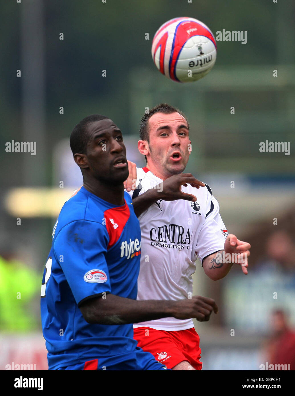 Inverness' Lionel Djebi-Zadi (left) and Falkirk's Carl Finnigan battle ...
