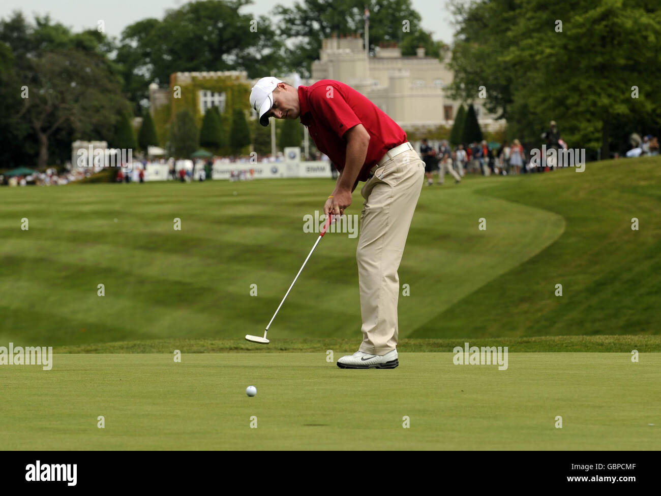 Scotland's Marc Warren putts on the 1st green during Round 3 of the BMW ...