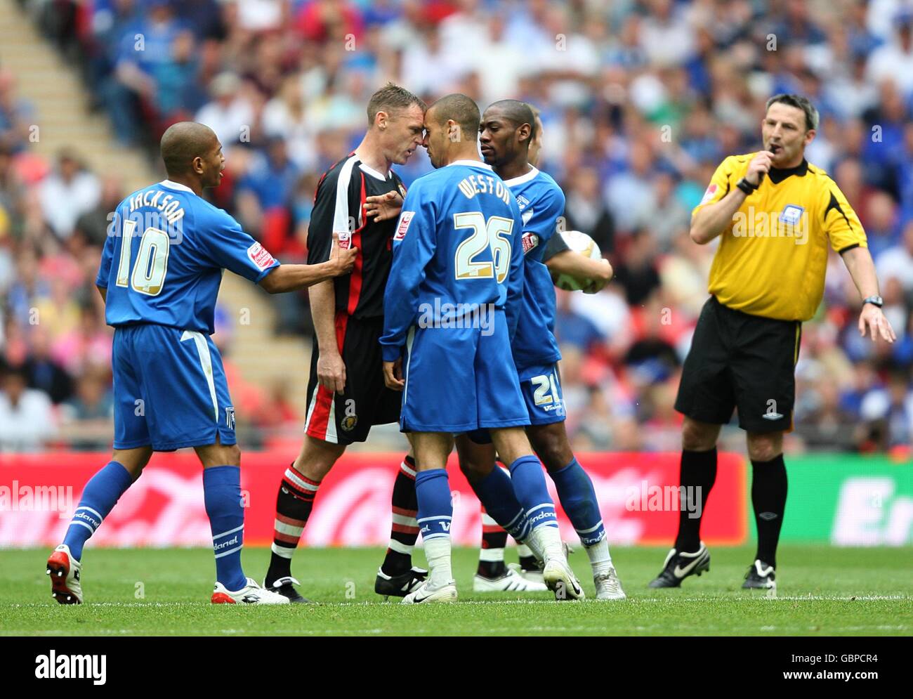 Resulting in both players being shown a yellow card hi-res stock ...