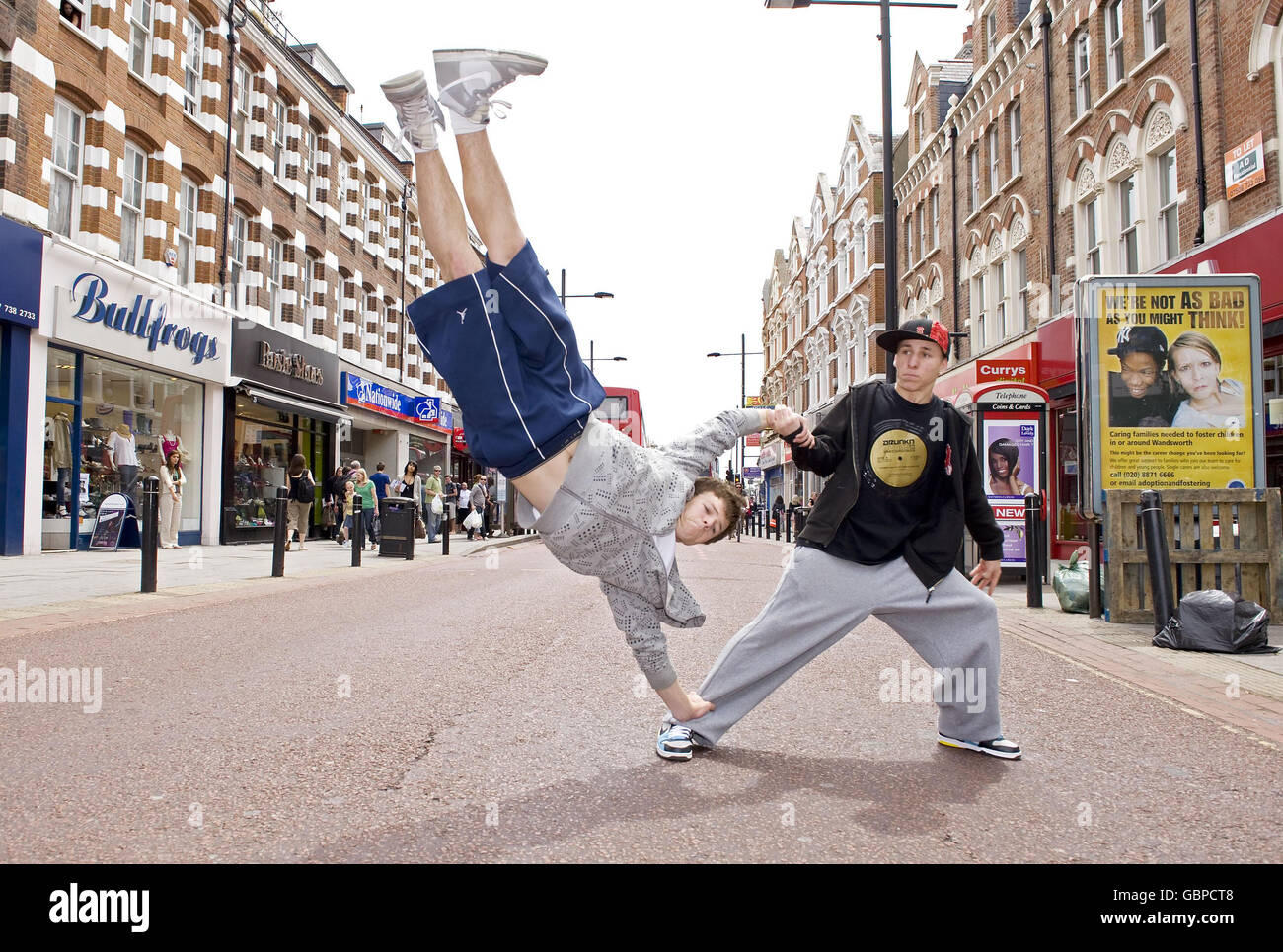 Urban dancers perform in the street in Brixton, south London, to ...