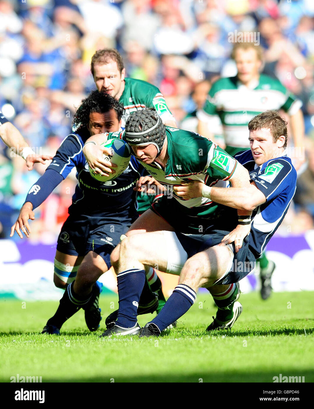 Rugbyu leinster full length tackling mangsm hi-res stock photography ...