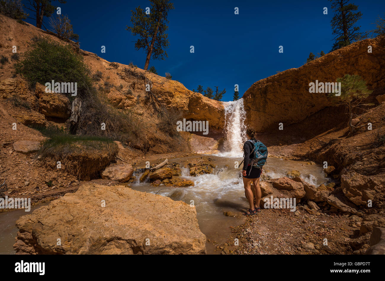 Backpacker Girl Exploring Bryce Canyon Waterfall near Mossy Cave USA ...
