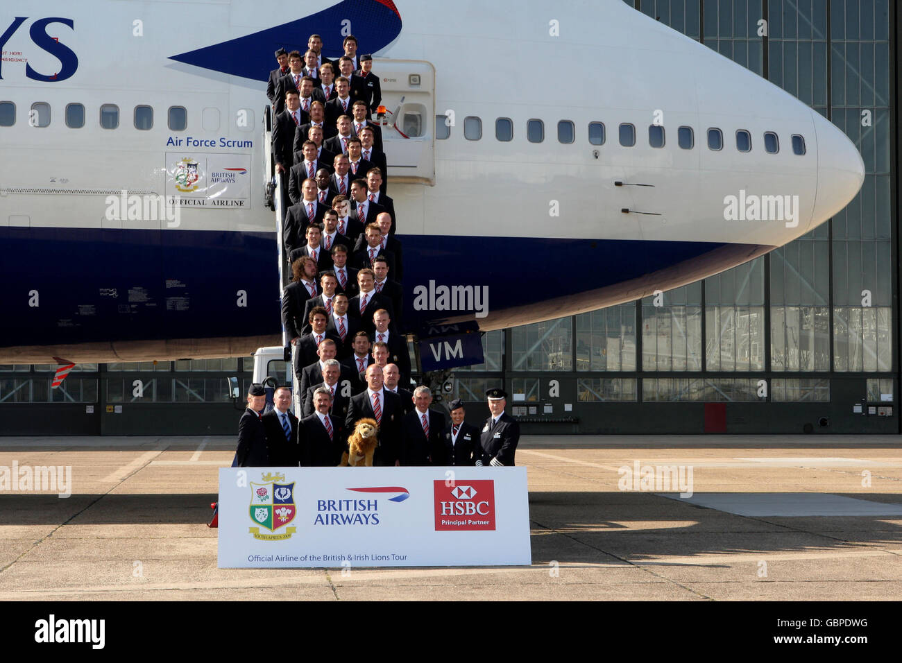 The British Lions rugby team poses for media on the steps of a British ...