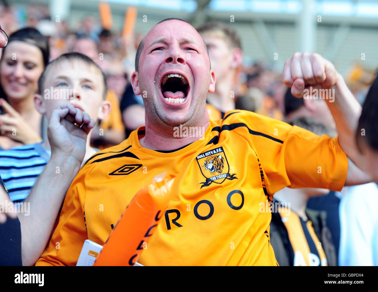 A Hull City fan celebrates at the final whistle as Hull stay in the ...