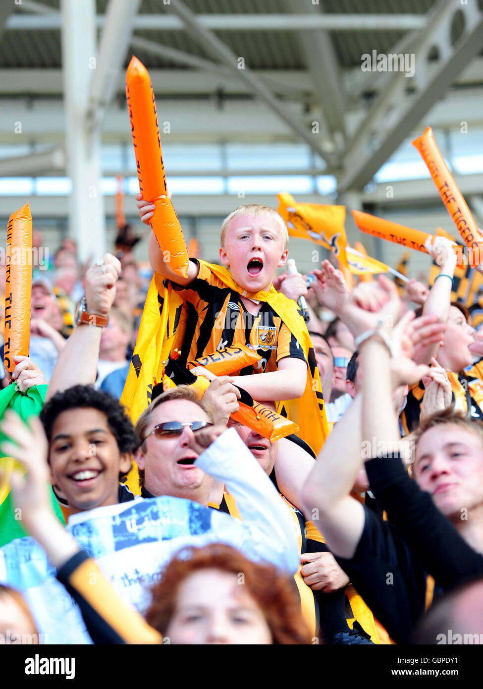 Hull fans celebrate at the final whistle as Hull stay in the Premier ...