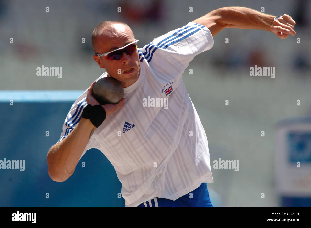 Athletics olympic games 2004 mens decathlon shot put group hi-res stock ...