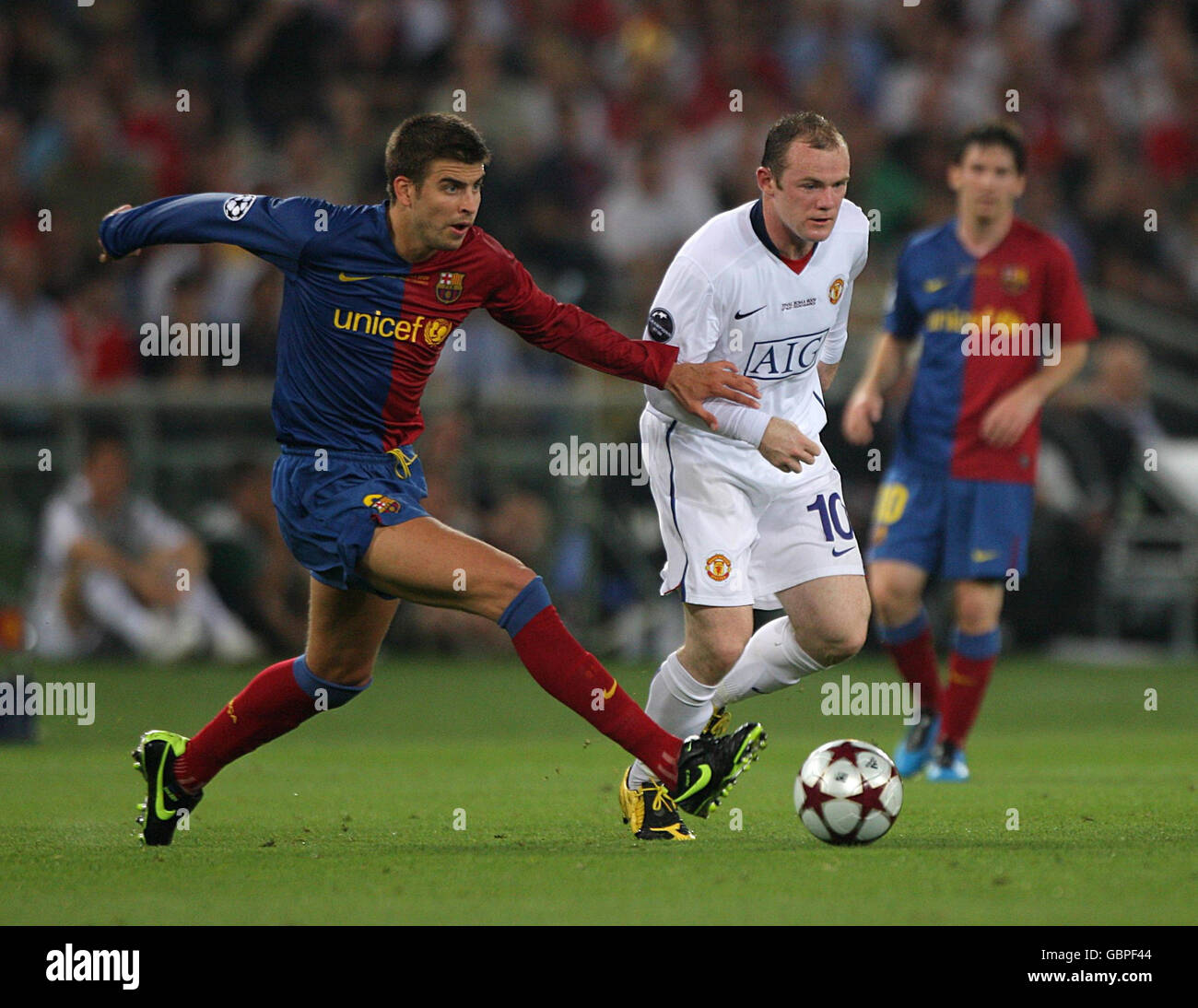 Manchester United's Wayne Rooney and Barcelona's Gerard Pique (left ...