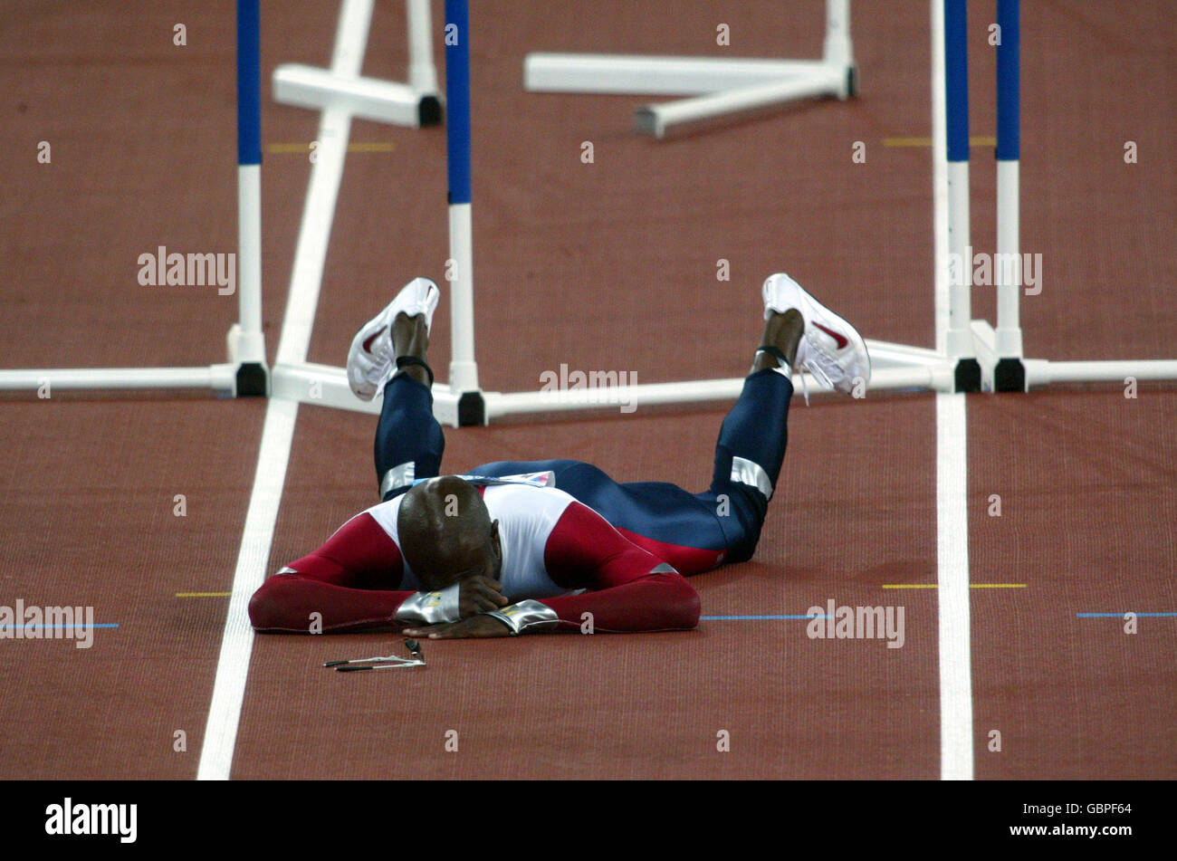 Athletics - Athens Olympic Games 2004 - Men's 110m Hurdles - Round Two ...