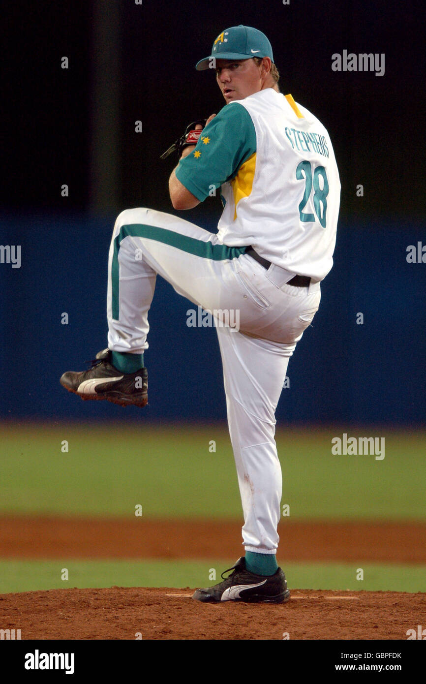 Australias pitcher john stephens in action hi-res stock photography and ...