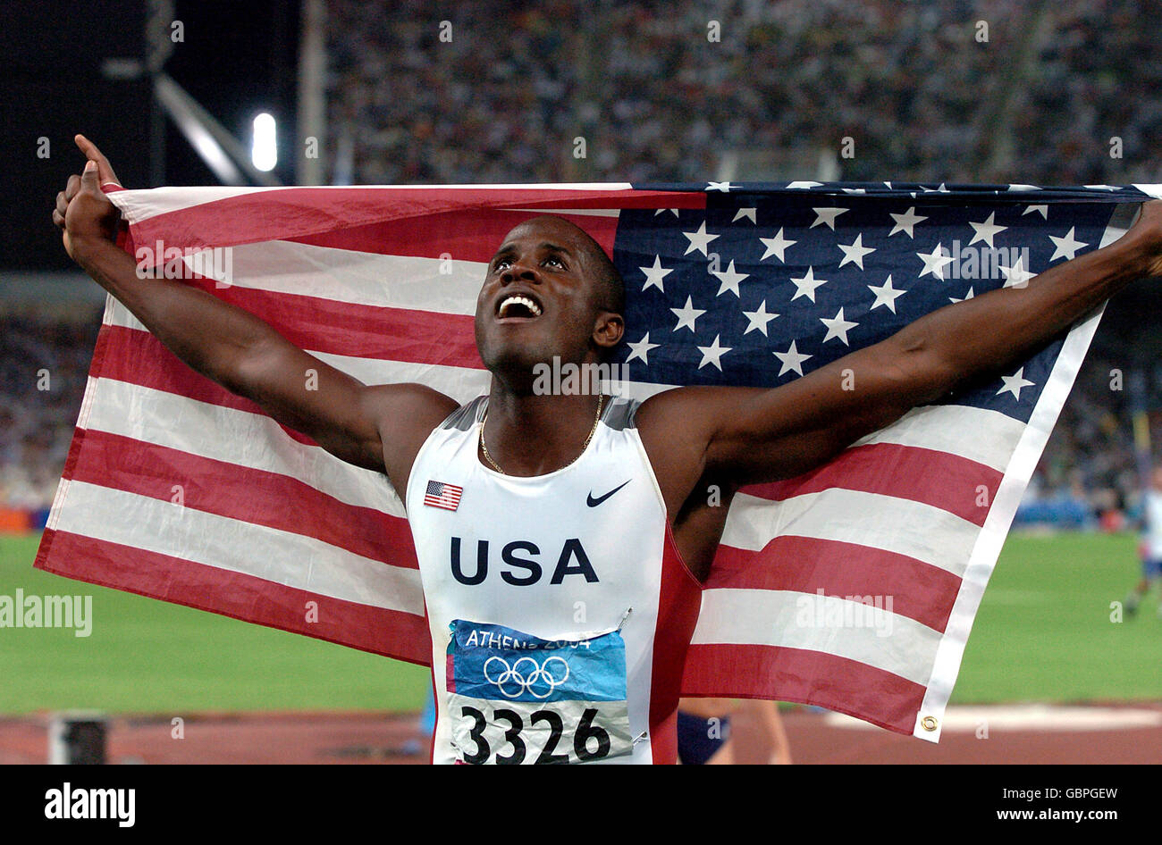 USA's Dwight Phillips celebrates winning the gold medal in the Long ...
