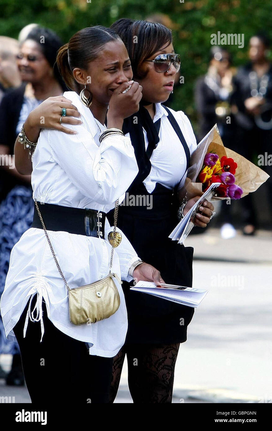 Mourners attend the funeral of Giuseppe Gregory, 16, at St John ...