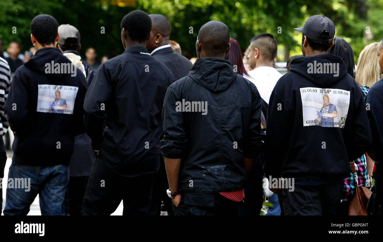 Mourners attend the funeral of Giuseppe Gregory, 16, at St John ...