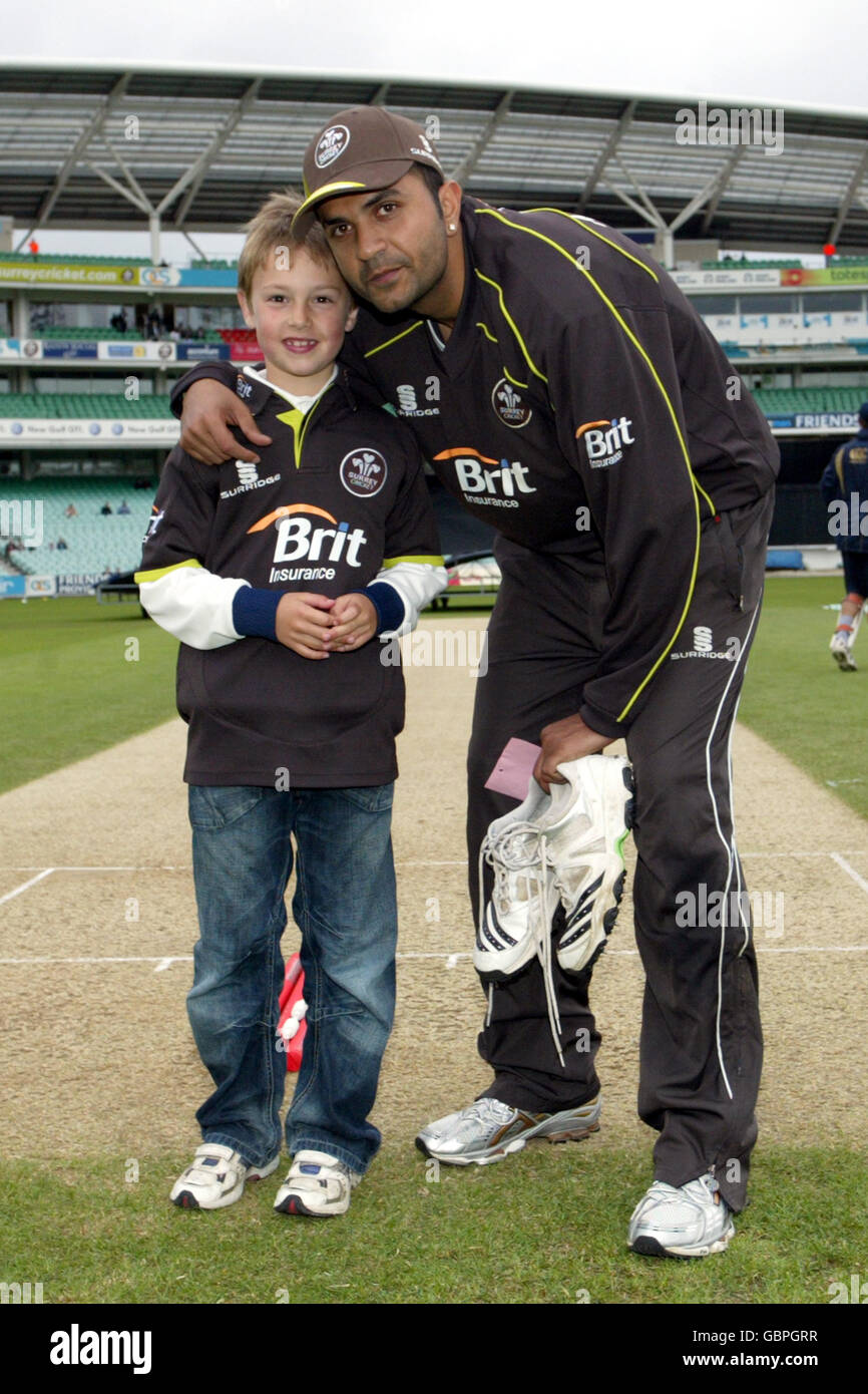 Surrey Brown Caps captain Usman Afzaal poses for a photograph with the ...