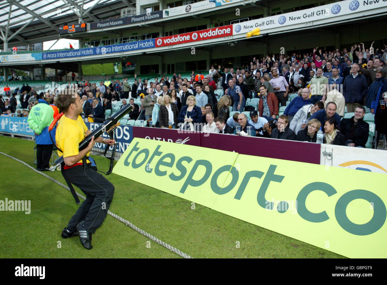 A 'master blaster' t-shirt gun is used during the interval with the ...