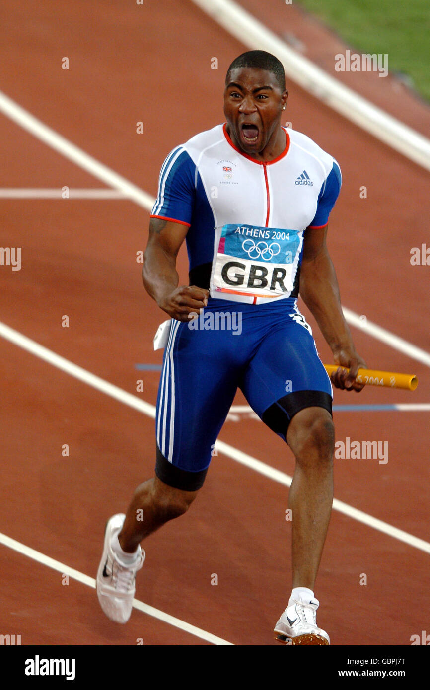 Great Britain's Mark Lewis-Francis crosses the line in disbelief as he ...