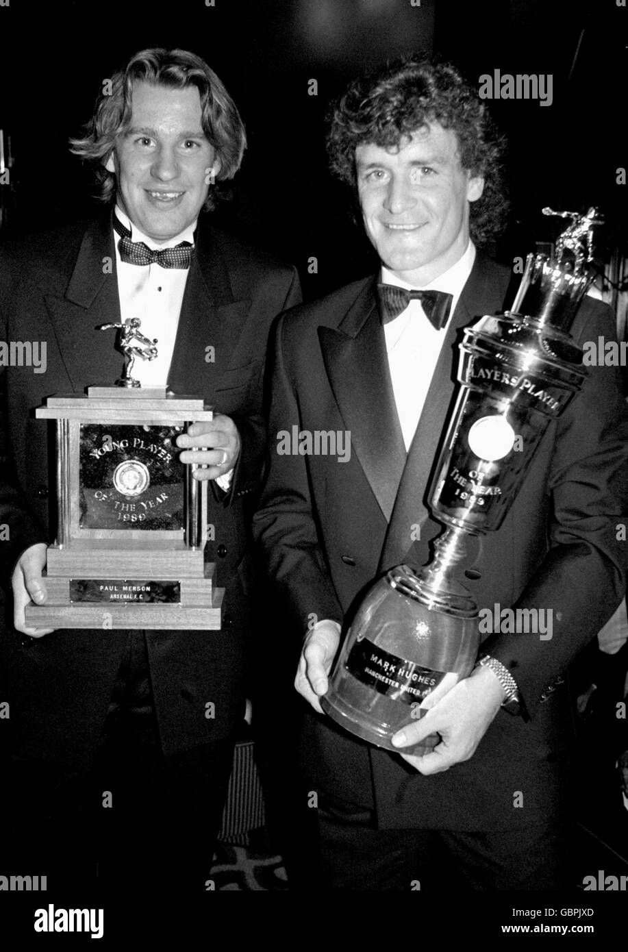 Show off their respective trophies hi-res stock photography and images ...