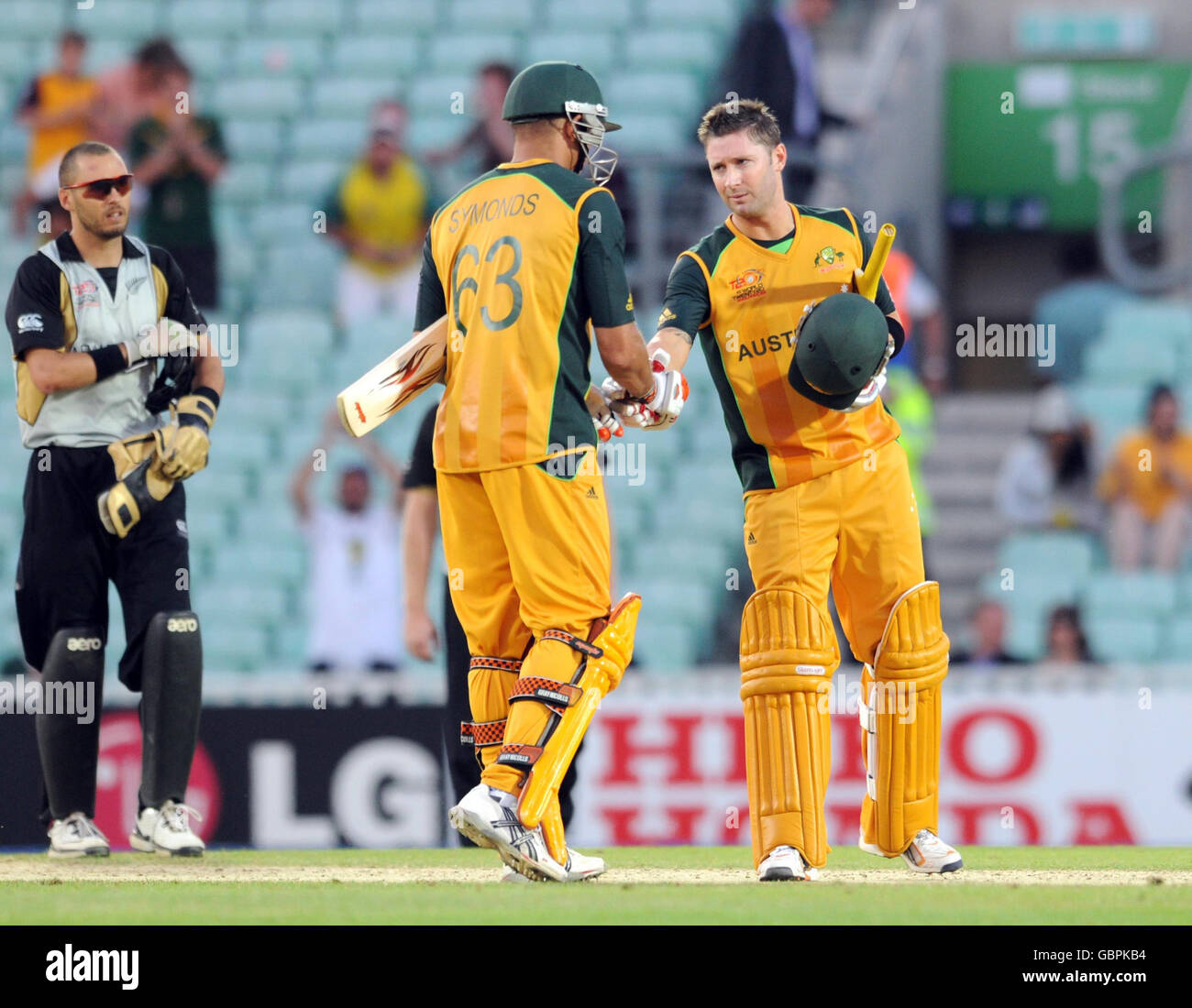 Australia's Andrew Simmonds and Michael Clarke shake hands after ...