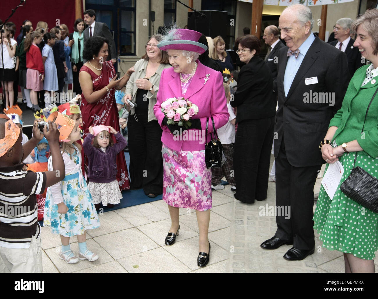 Queen visits Coram children's charity Stock Photo - Alamy