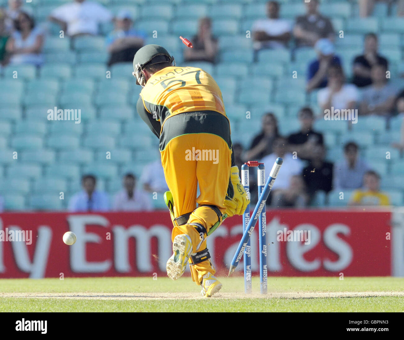 Australia's Matthew Hadin runs out New Zealand's Jacob Oram during the ...