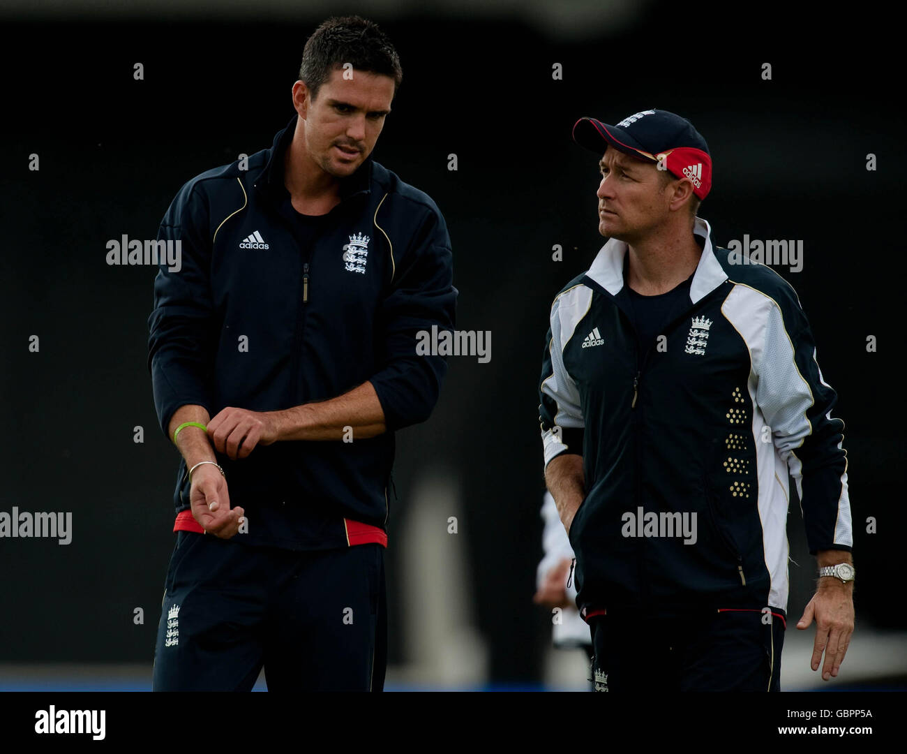England's Kevin Pietersen warms up with physio Kirk Russell before ...