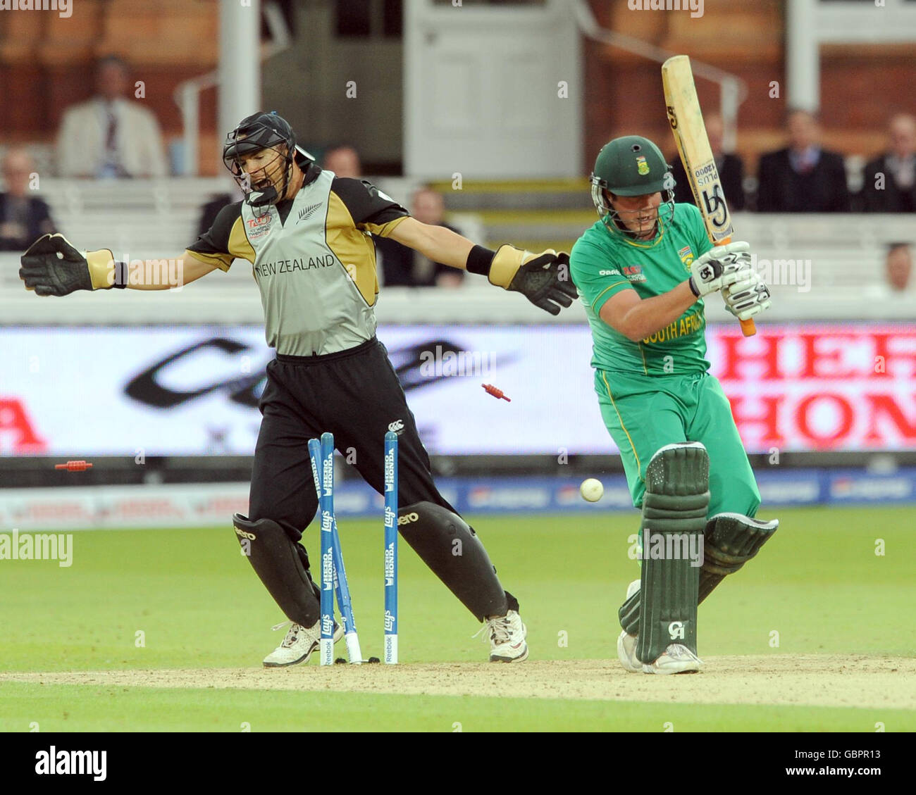 South Africa's Roelof Van Der Merwe is bowled out by New Zealand's ...