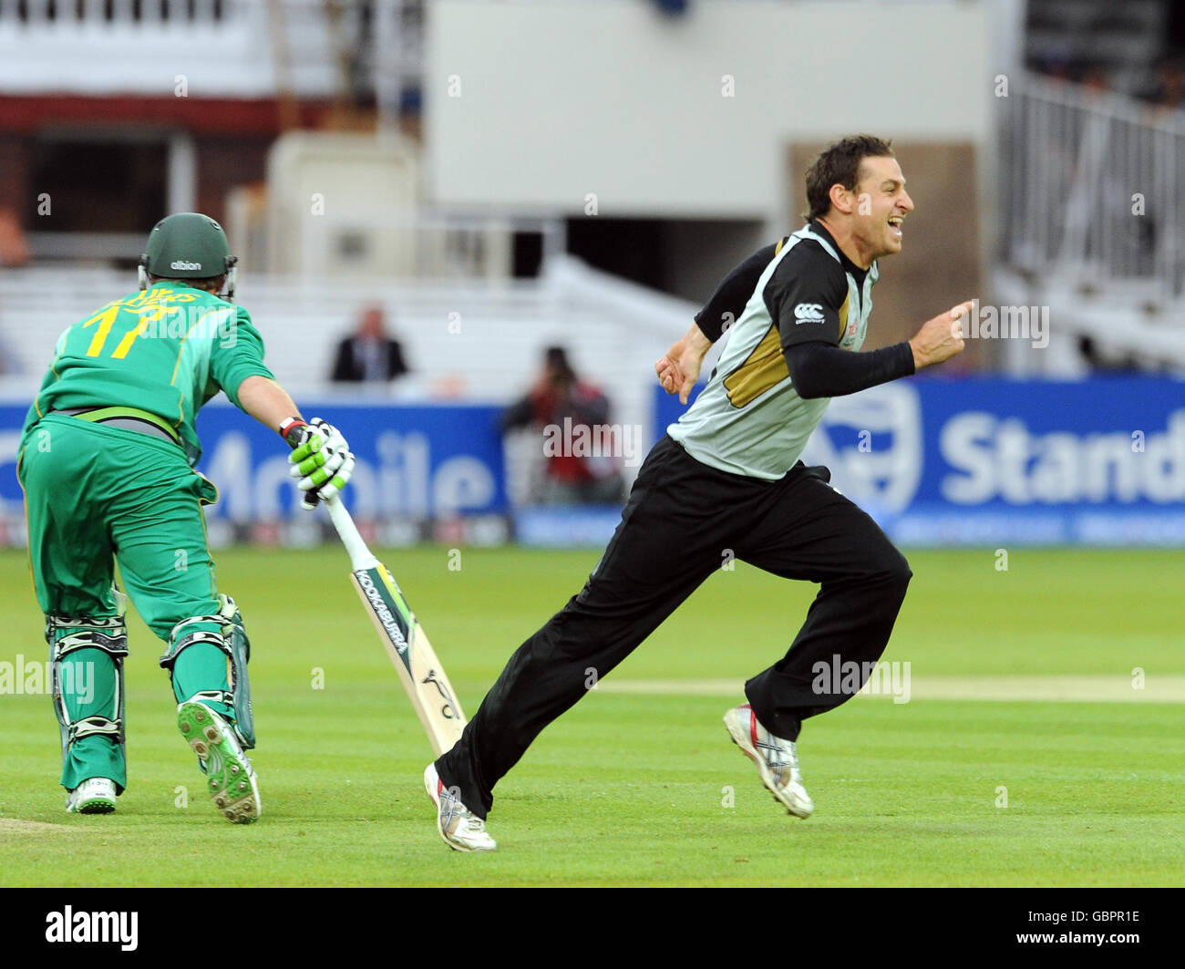 New Zealand's Nathan McCullum celebrates as South Africa's Abraham ...