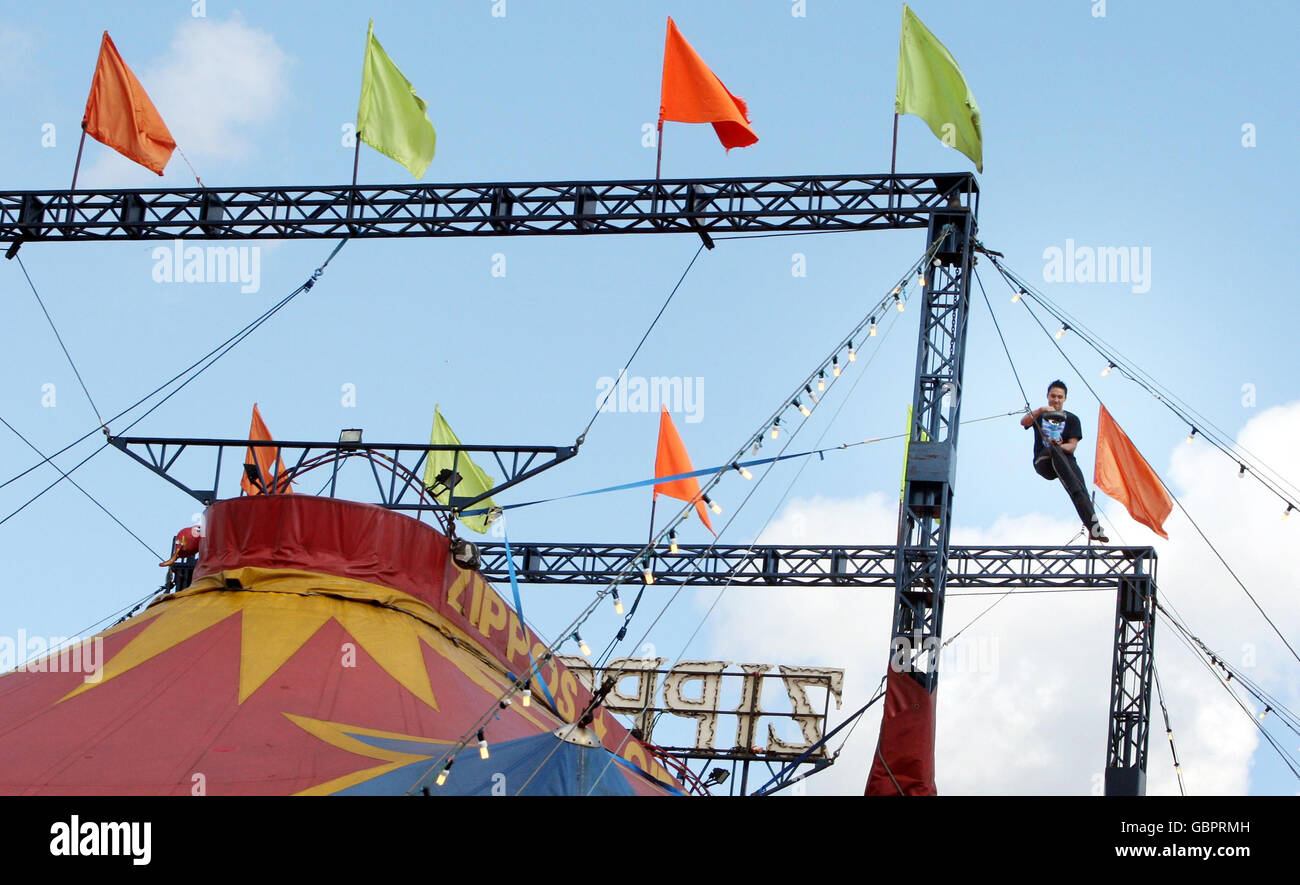 High wire walker Chico Marinhos cooks an omelette whilst walking an ...