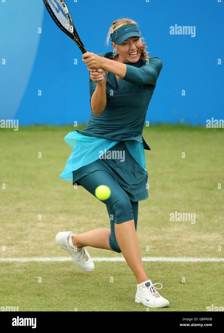 Russia's Maria Sharapova in action against USA's Alexa Glatch during ...