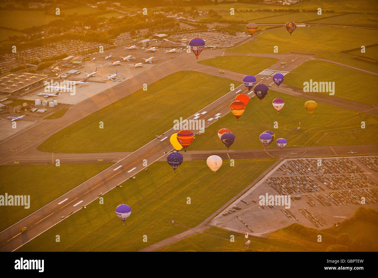 Hot air balloons lift off from the main runway at Bristol International ...