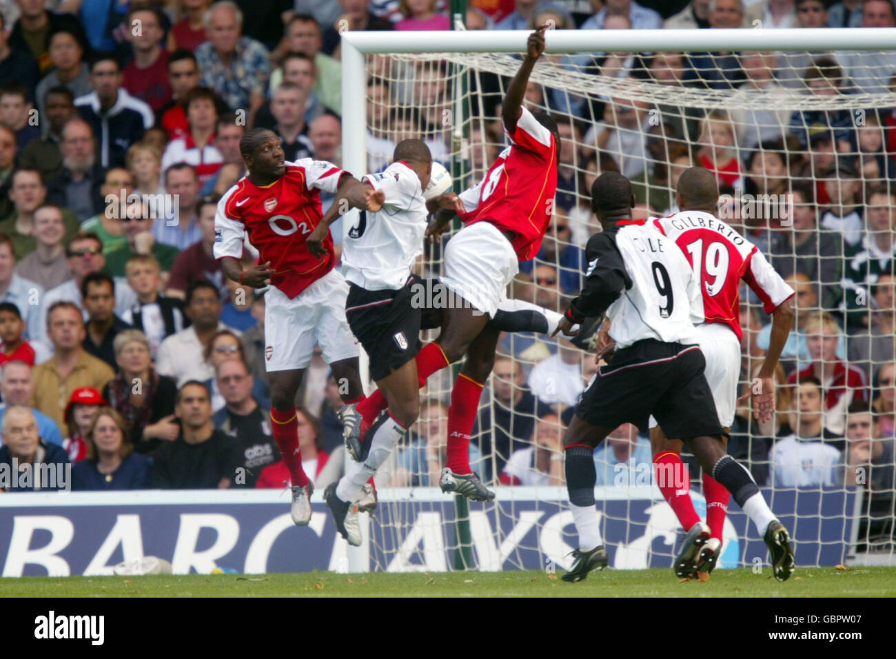 Fulham's Collins John (2nd from l) scores a goal only for it to be ...
