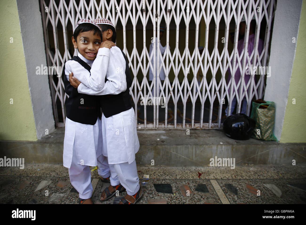 Muslim hug mosque hi-res stock photography and images - Alamy
