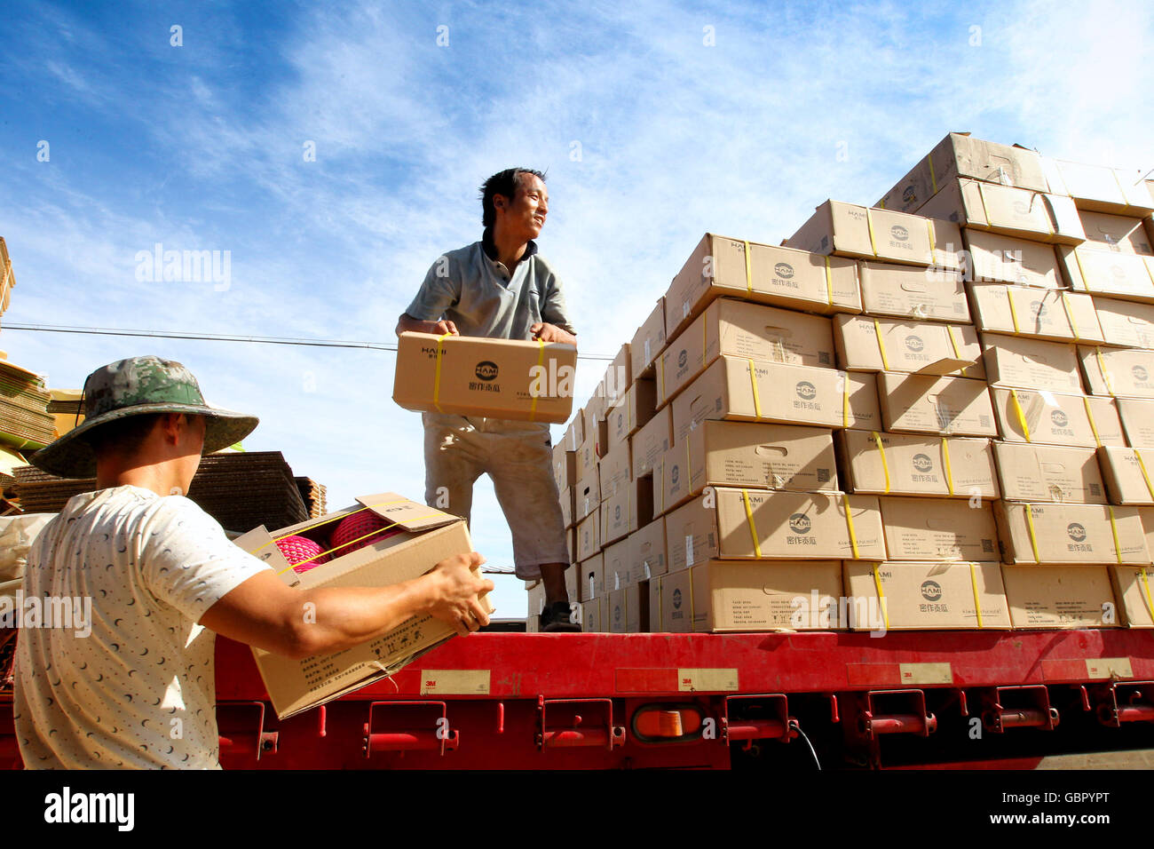 Hami, China's Xinjiang Uygur Autonomous Region. 7th July, 2016. Farmers ...