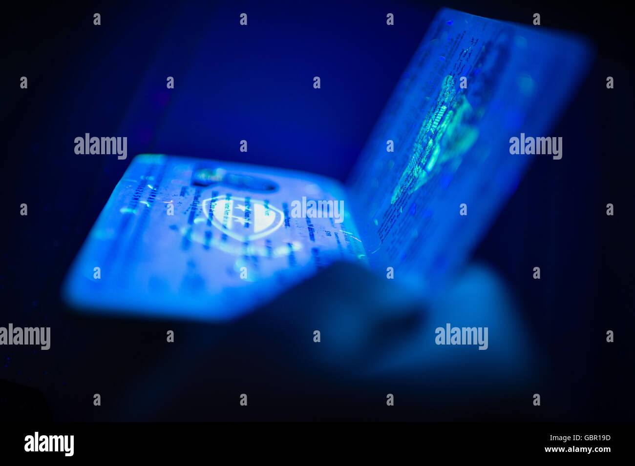 Passport in uv light hi-res stock photography and images - Alamy